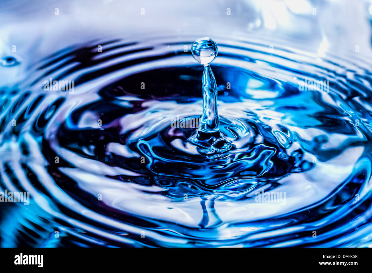 A beautiful shape created by the fluid motion of water splashing as it ...