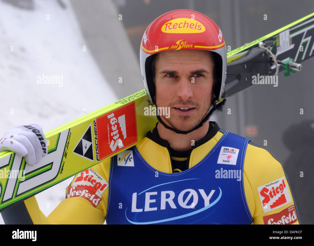 Felix Gottwald from Austria carries his skies during the Ski Jumping ...