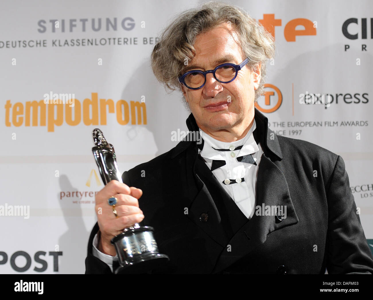 German film director Wim Wenders poses with his award during the 24th ...