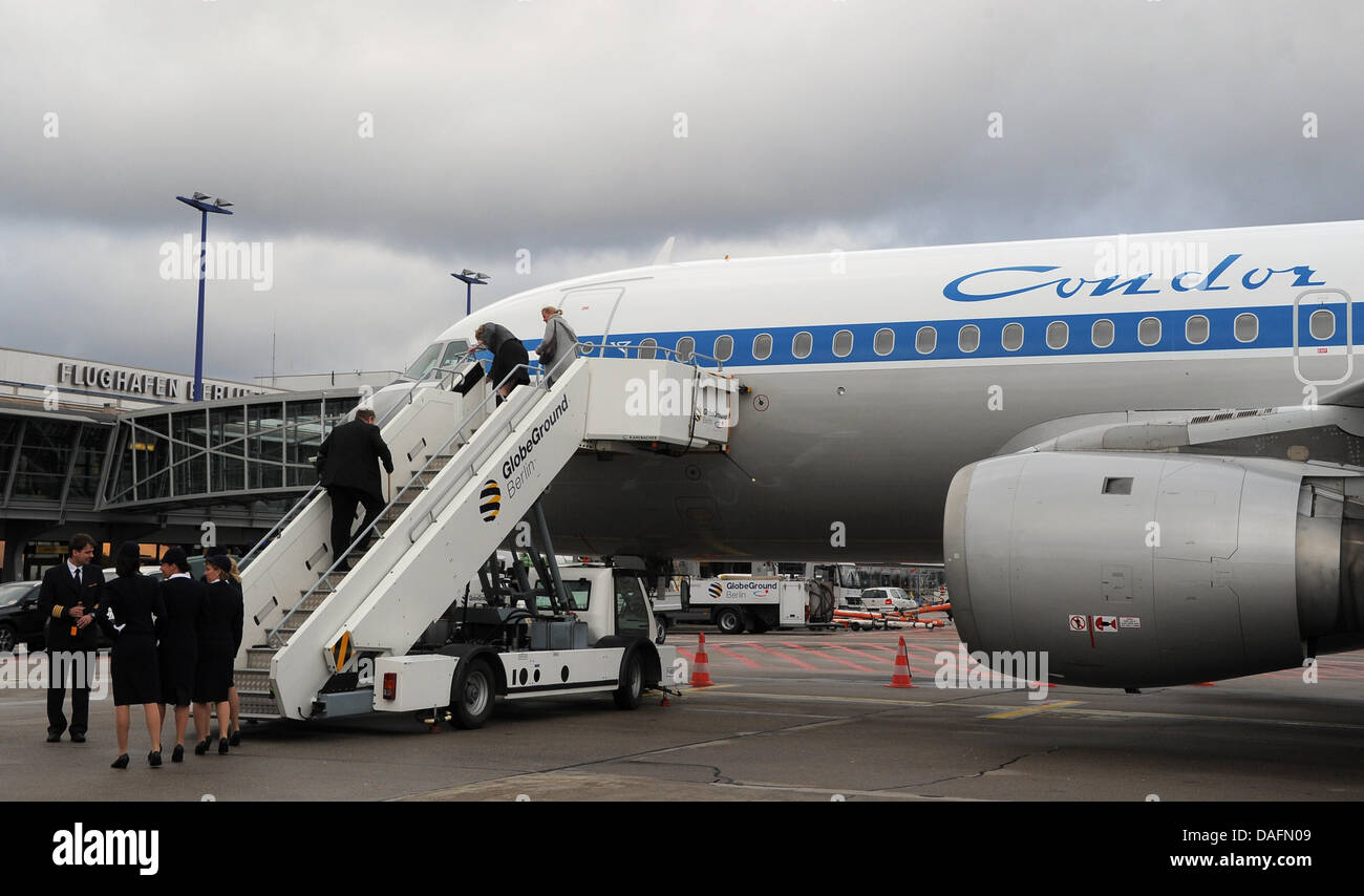 A special retro-style Condor aircraft is parked at the aiport in ...