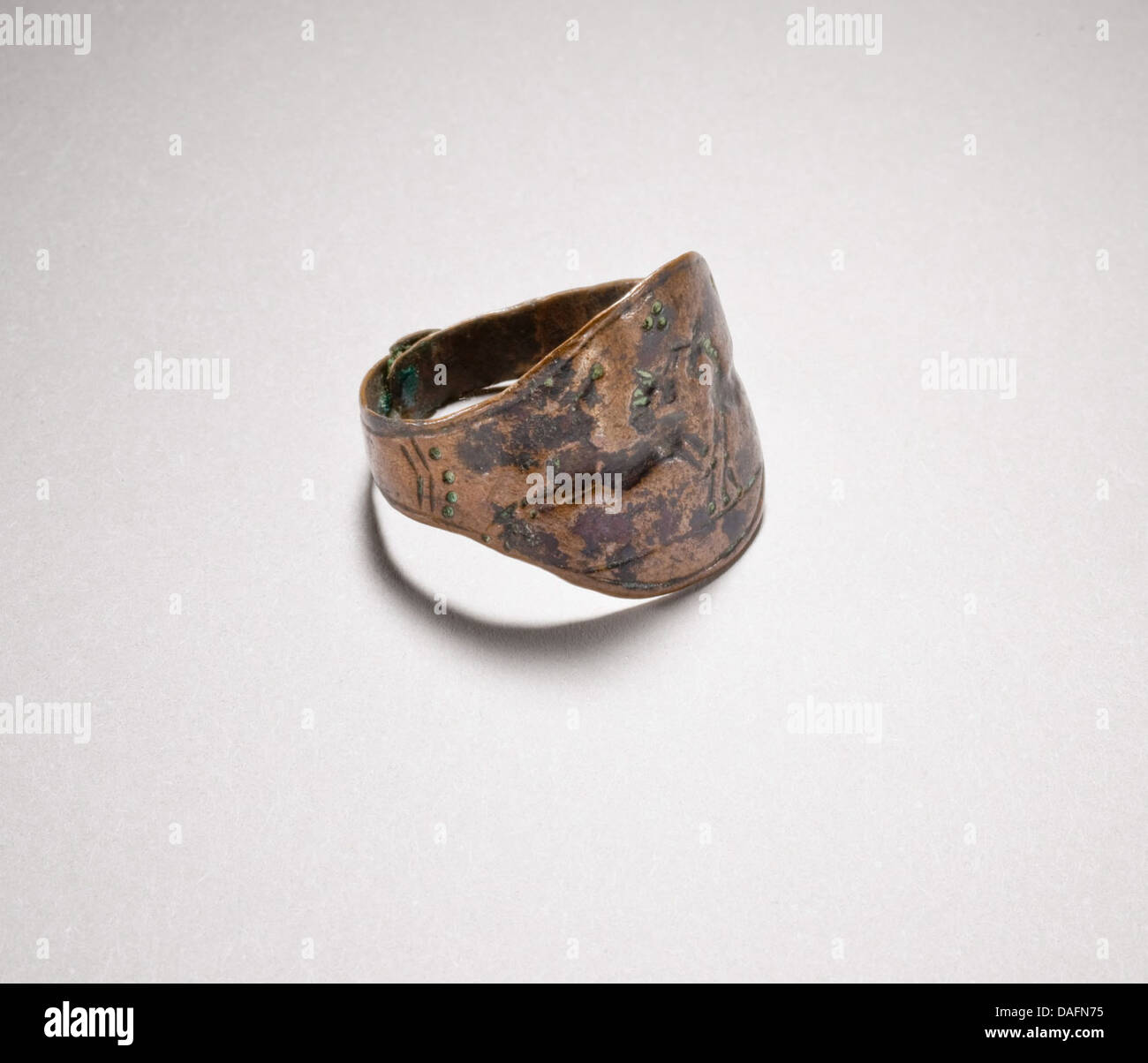 This bronze finger ring is a refined example of ancient jewelry ...