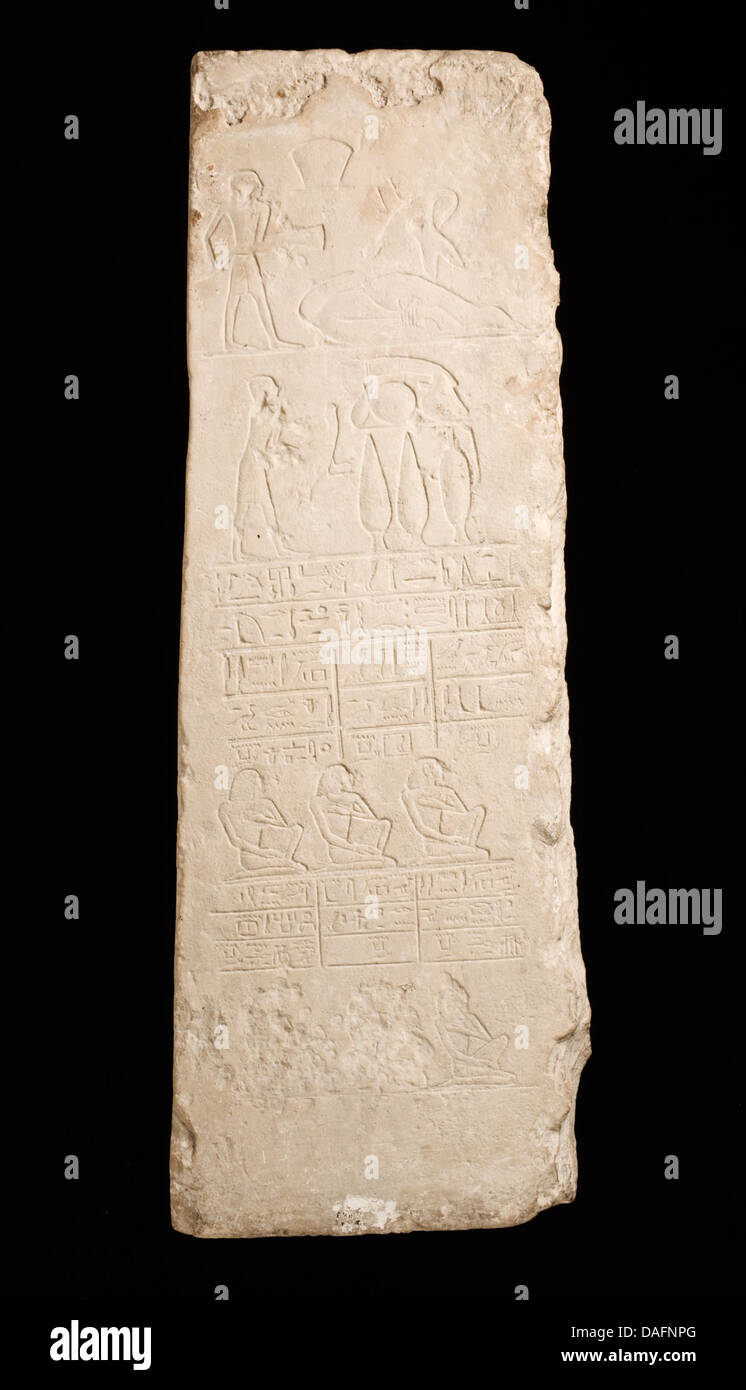 This ancient Egyptian tomb relief fragment depicts three officials ...