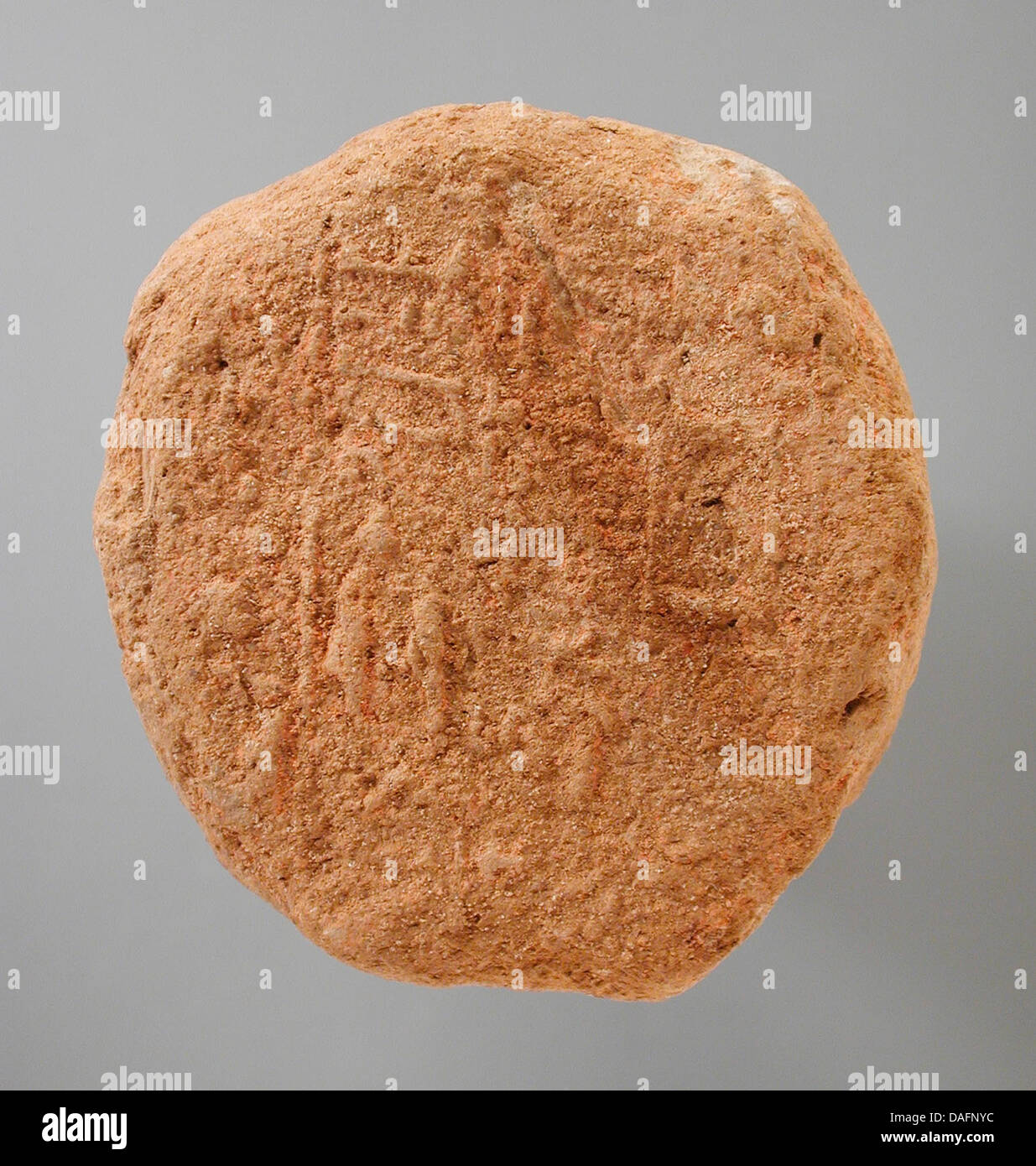 A funerary cone, used in burial rituals, showcasing ancient Egyptian ...