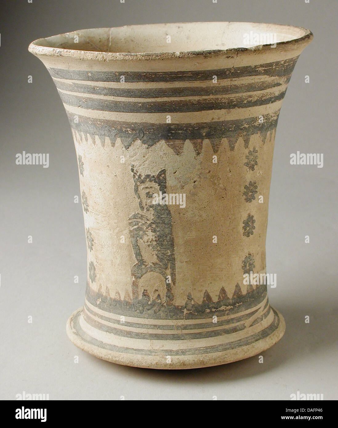 This goblet, made of glass, features intricate design work typical of ...