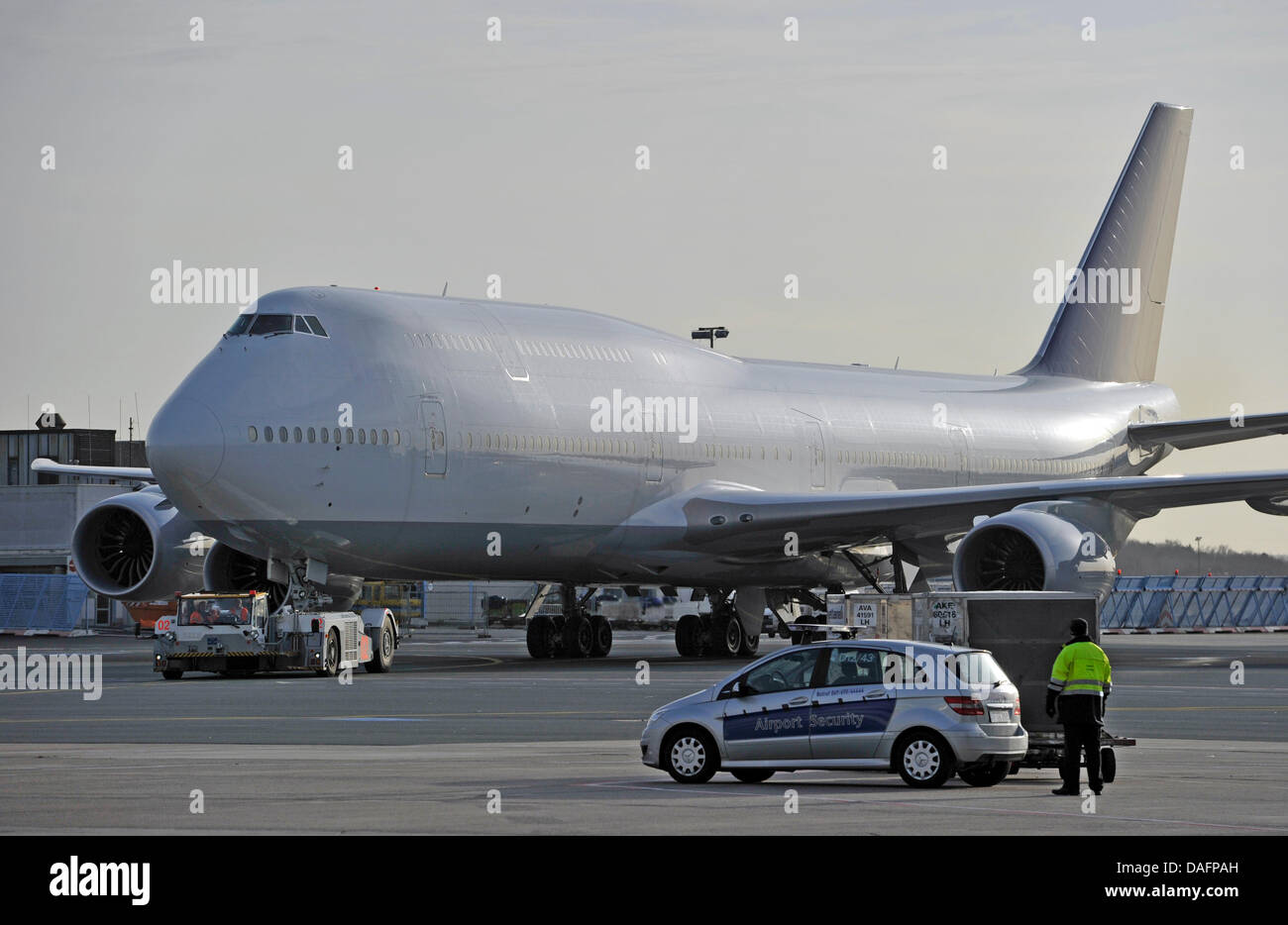 A Boeing 747-8 Intercontinental rolls to a gate of the airport in ...