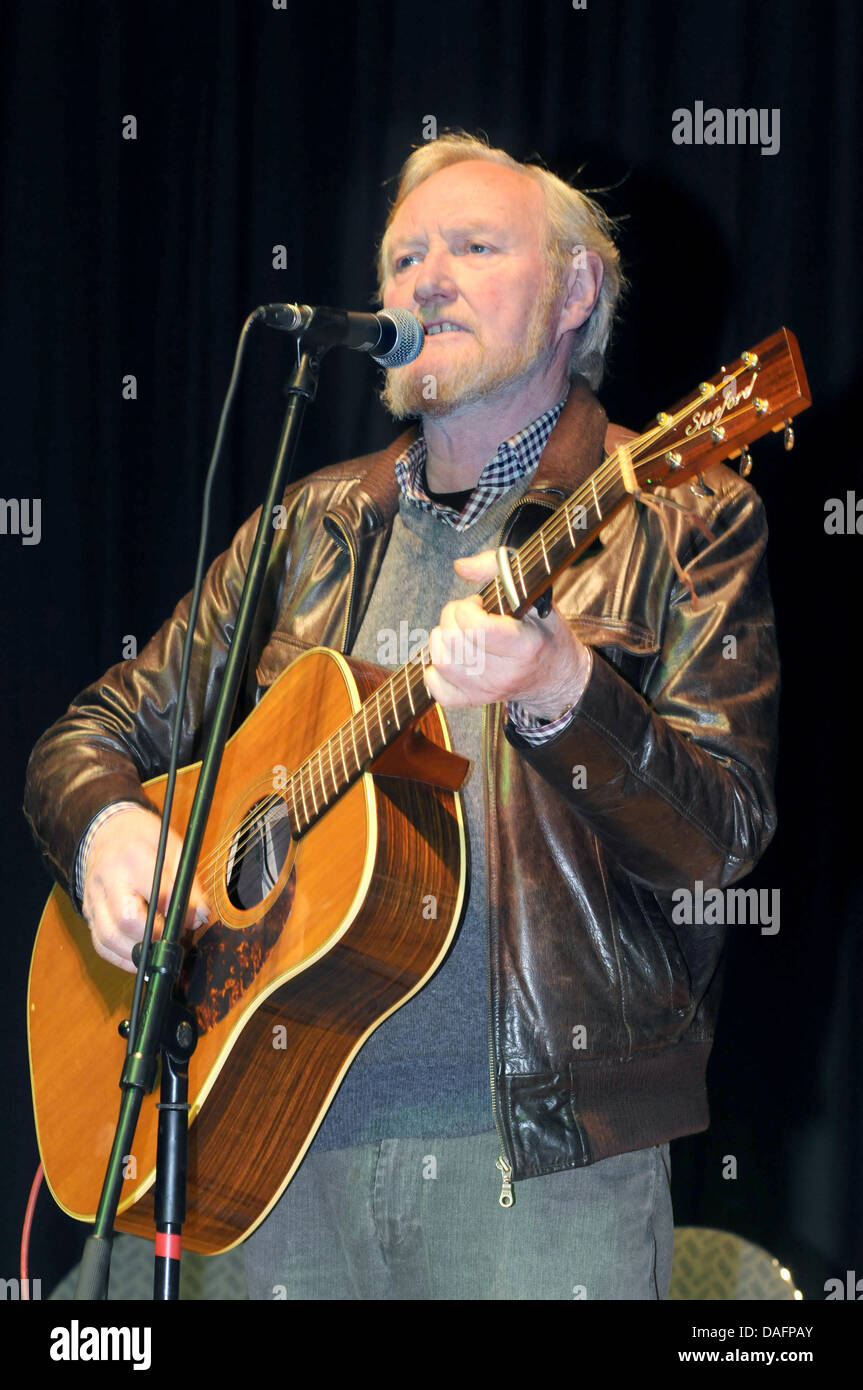 Member of the Irish folk band 'The Dubliners', Sean Cannon, performs ...