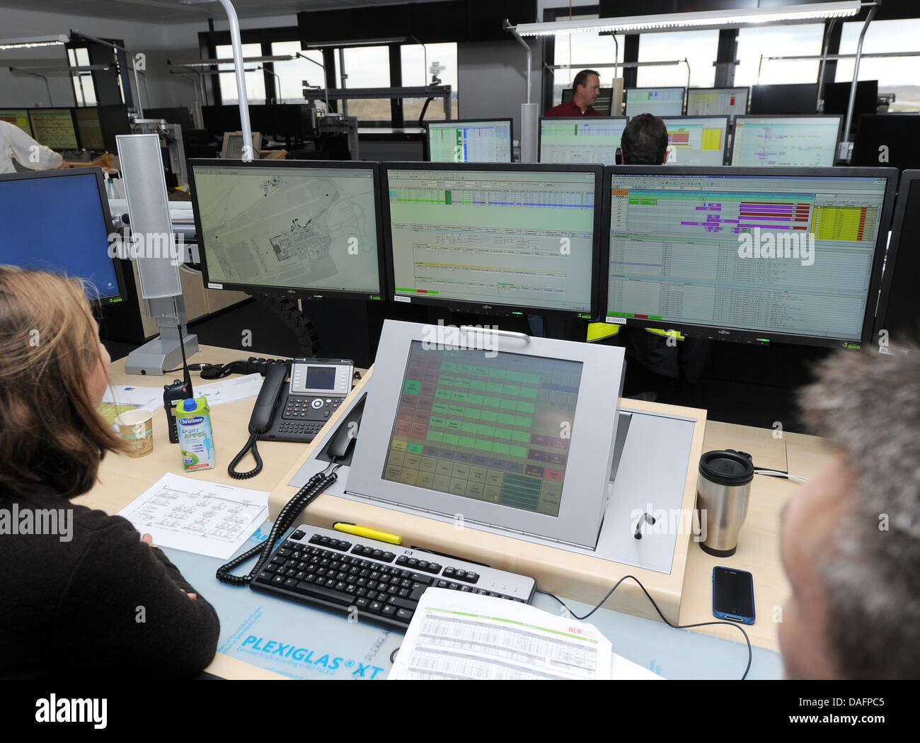 Airport Control Center employees check the logistics during a test-run ...