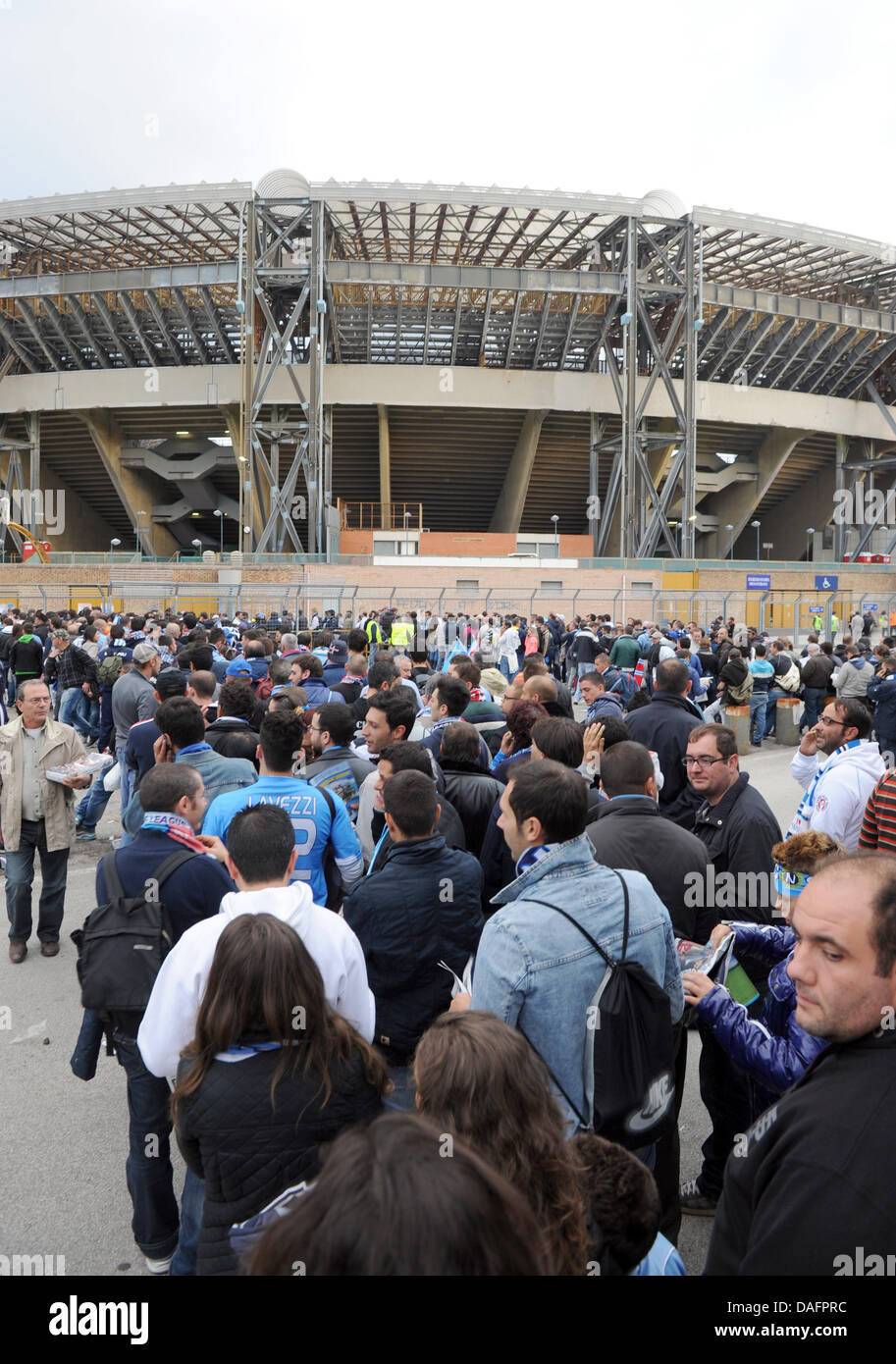 Soccer fans queue in front of the San Paolo soccer stadium in Naples ...