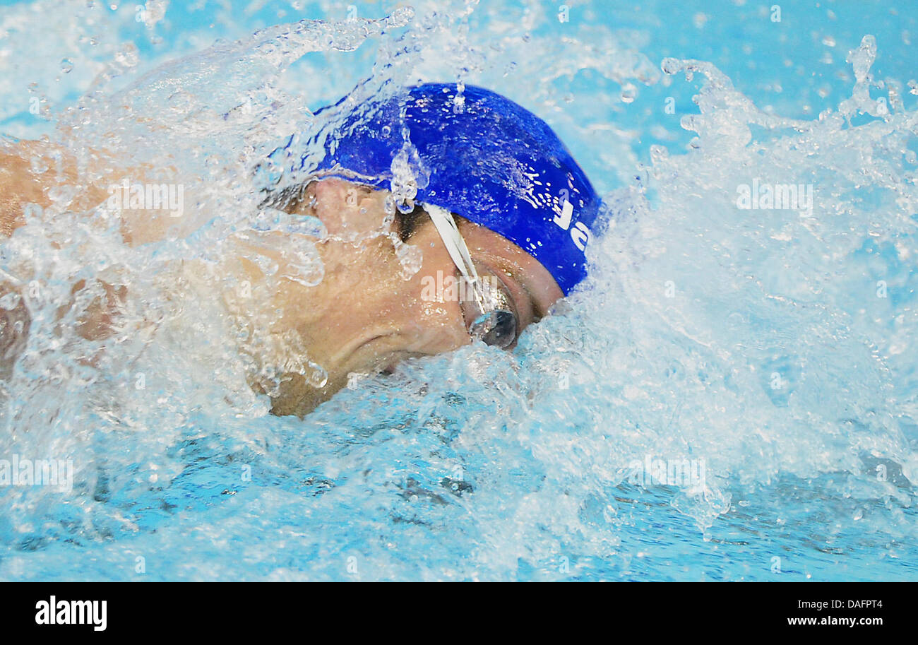 Luca Dotto of Italy competetes in his 100m Freestyle heat at the ...