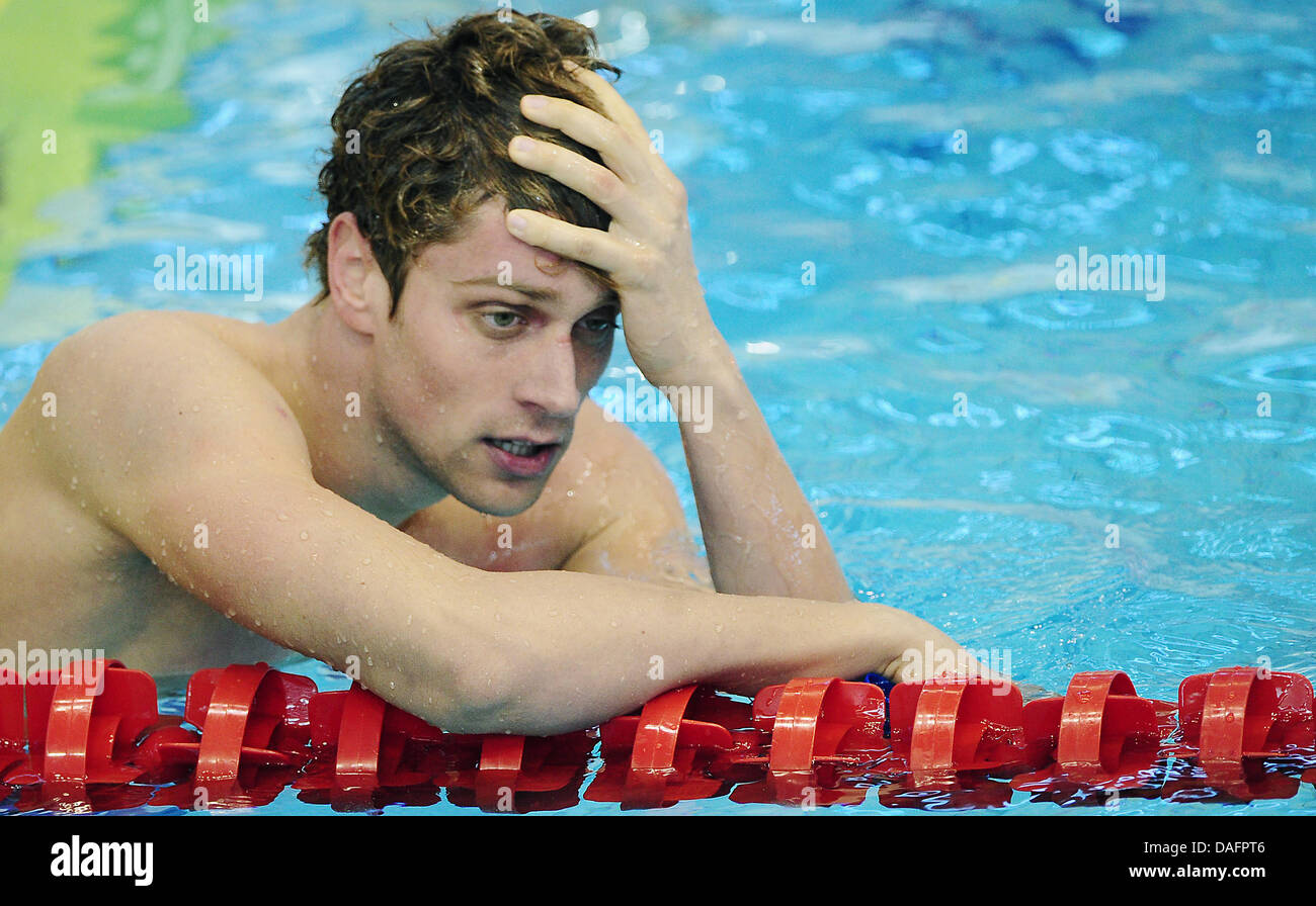 Luca Dotto of Italy reacts after his 100m Freestyle heat at the ...