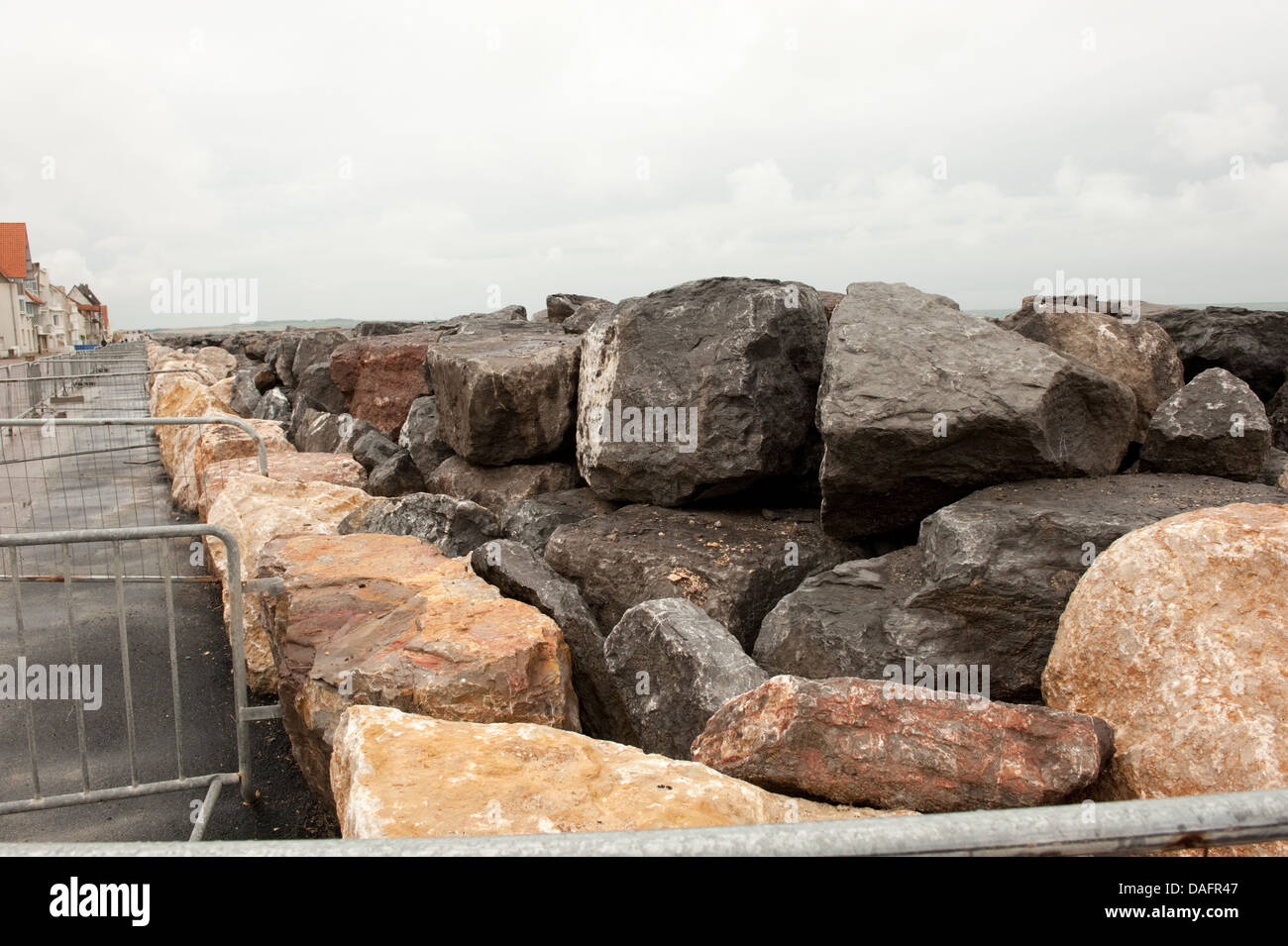 Sea defense rocks boulders Wissant France Stock Photo - Alamy