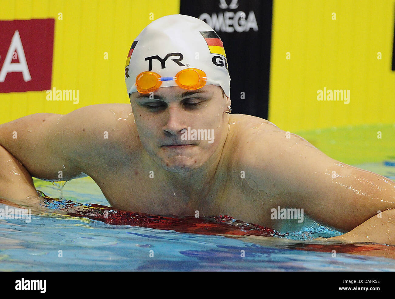 Christian Diener of Germany reacts after placing forth in the 50m ...