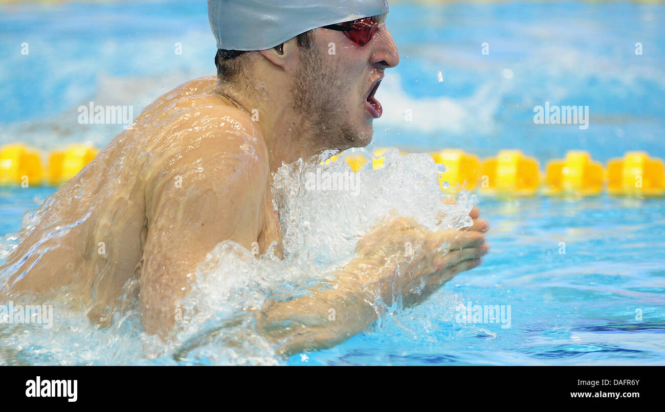 Markus Deibler from Germany competes in his 100m Individual Medley heat ...