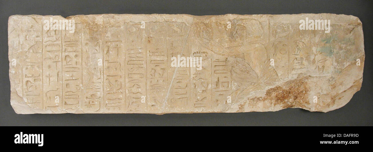 This inscribed lintel, made from stone, features detailed inscriptions ...