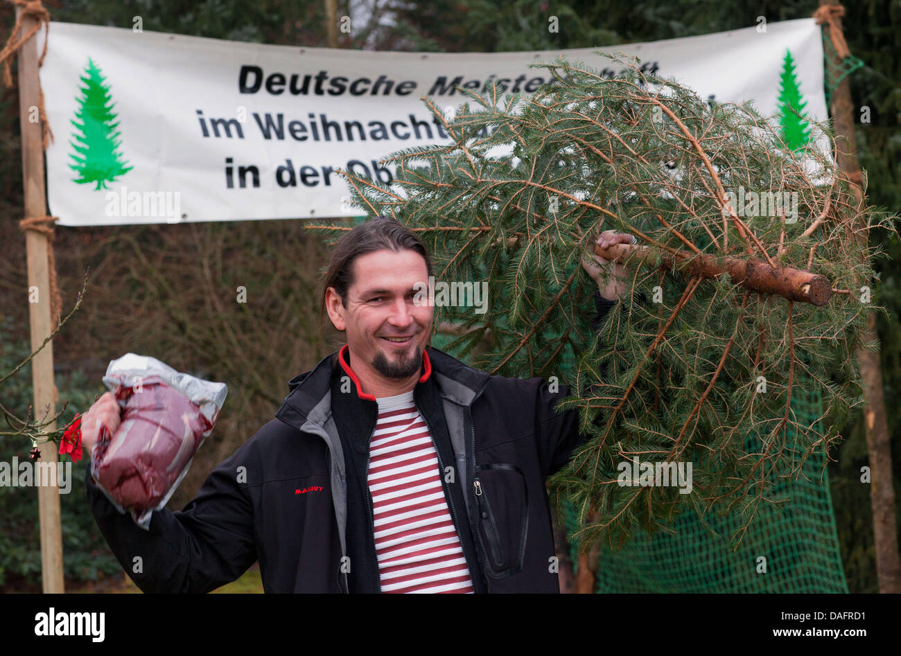 Winner Frank Pubanz cheers during the awarding ceremony of Christmas ...