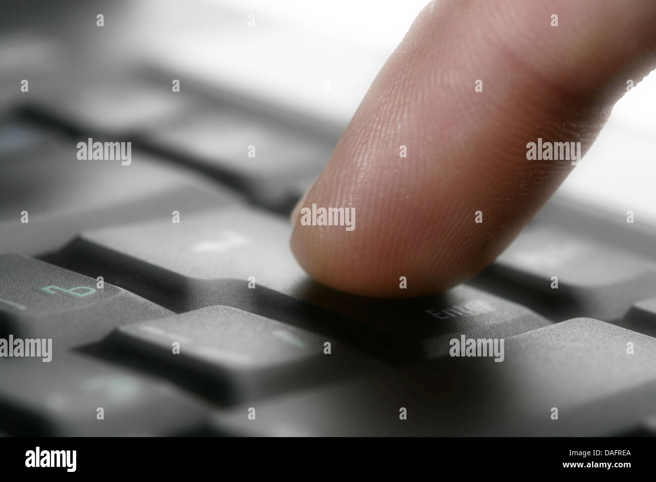 finger press notebook button concept Stock Photo - Alamy