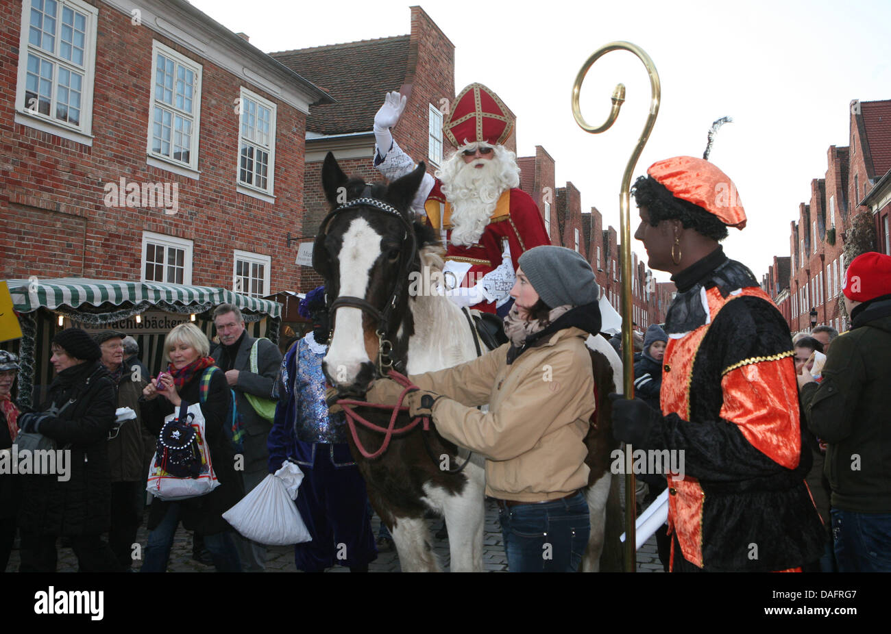 The Dutch Santa Claus called 'Sinterklaas' and the black Moor walk by ...