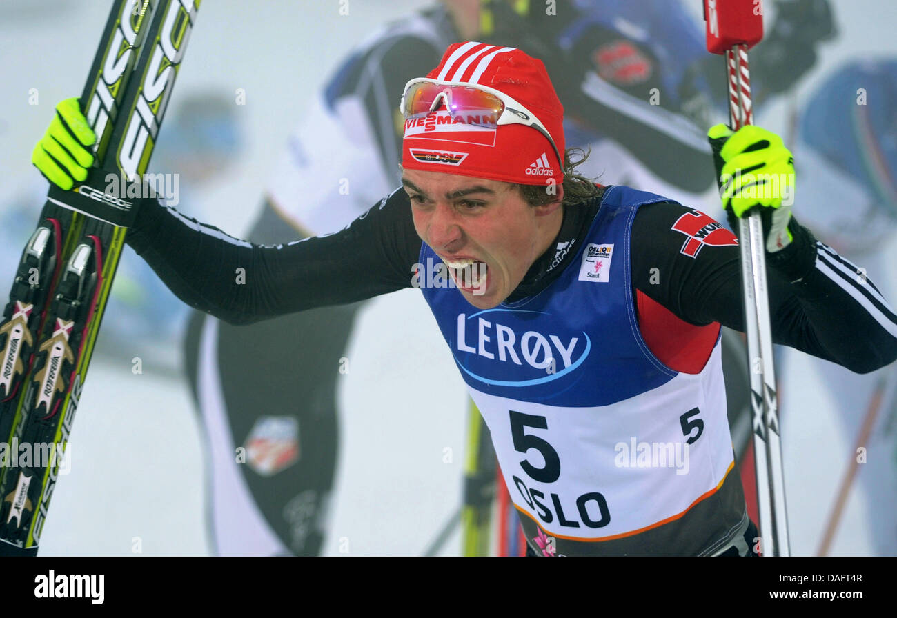 Johannes Rydzek of Germany celebrates in the finish area after winning ...