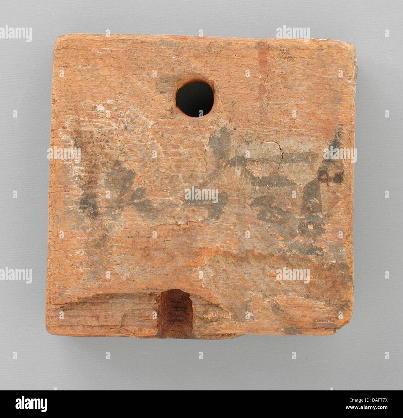 This ancient Egyptian label features a hieratic inscription, an early ...