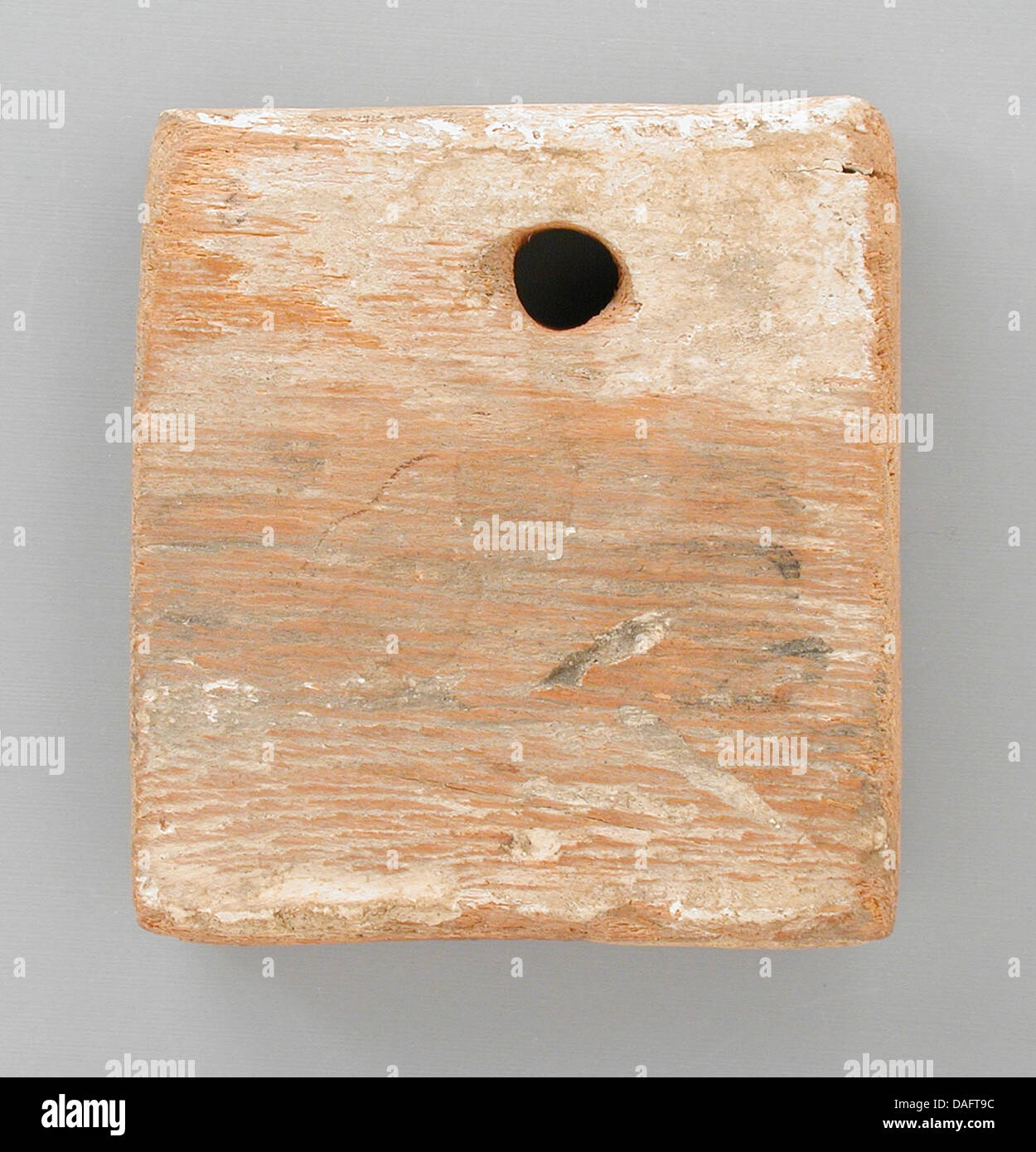 This label features a hieratic inscription, an ancient Egyptian writing ...