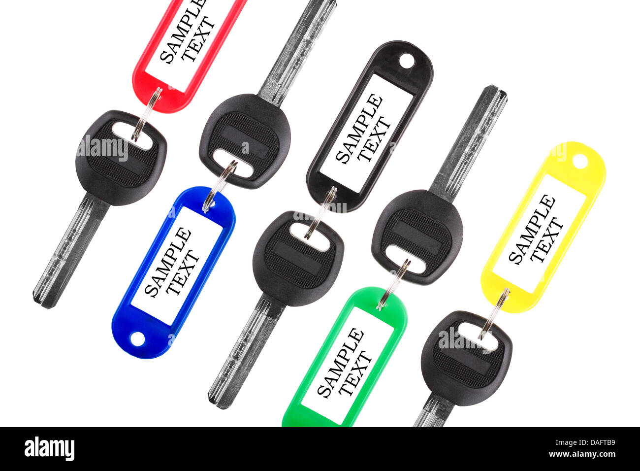 Keys on a white background. Keys with plastic tag Stock Photo - Alamy