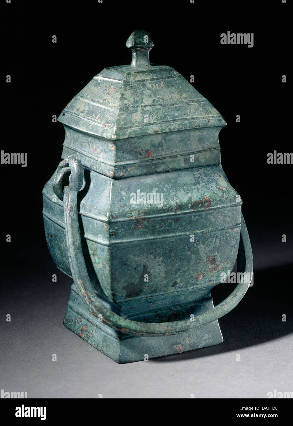 This square ritual wine bucket from ancient China features horizontal ...