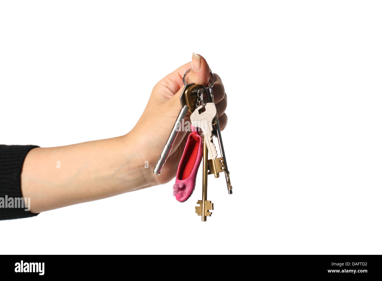 girl hand take key in fingers Stock Photo - Alamy