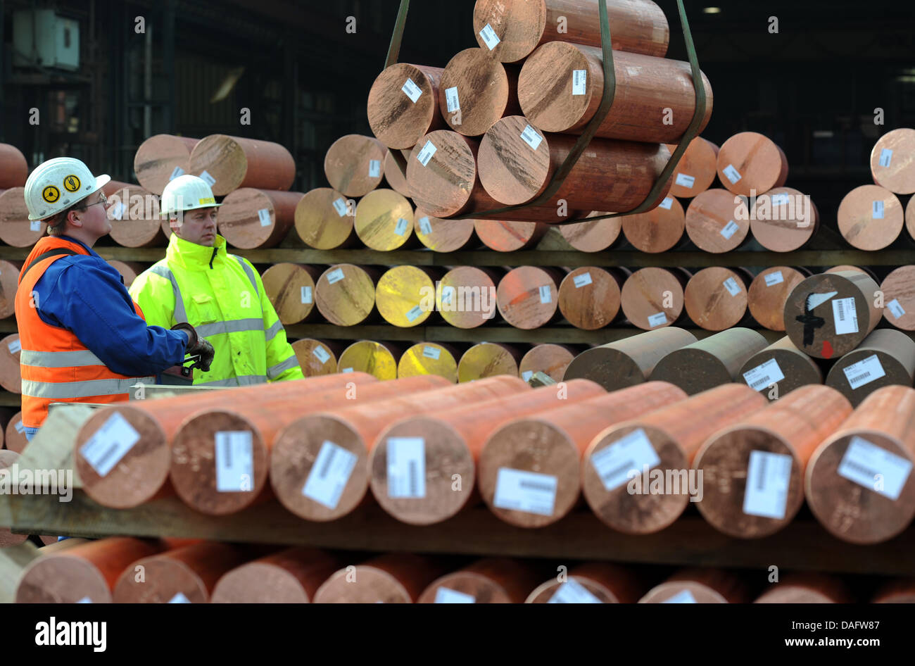An employee of Aurubis walks past continous casting at the copper ...