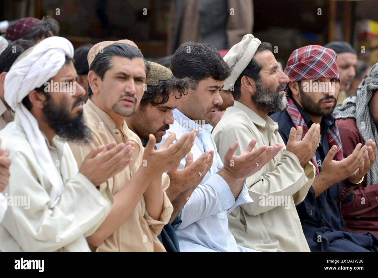 Muslims offering Dua after prayer on the first Friday of Ramzan-ul ...