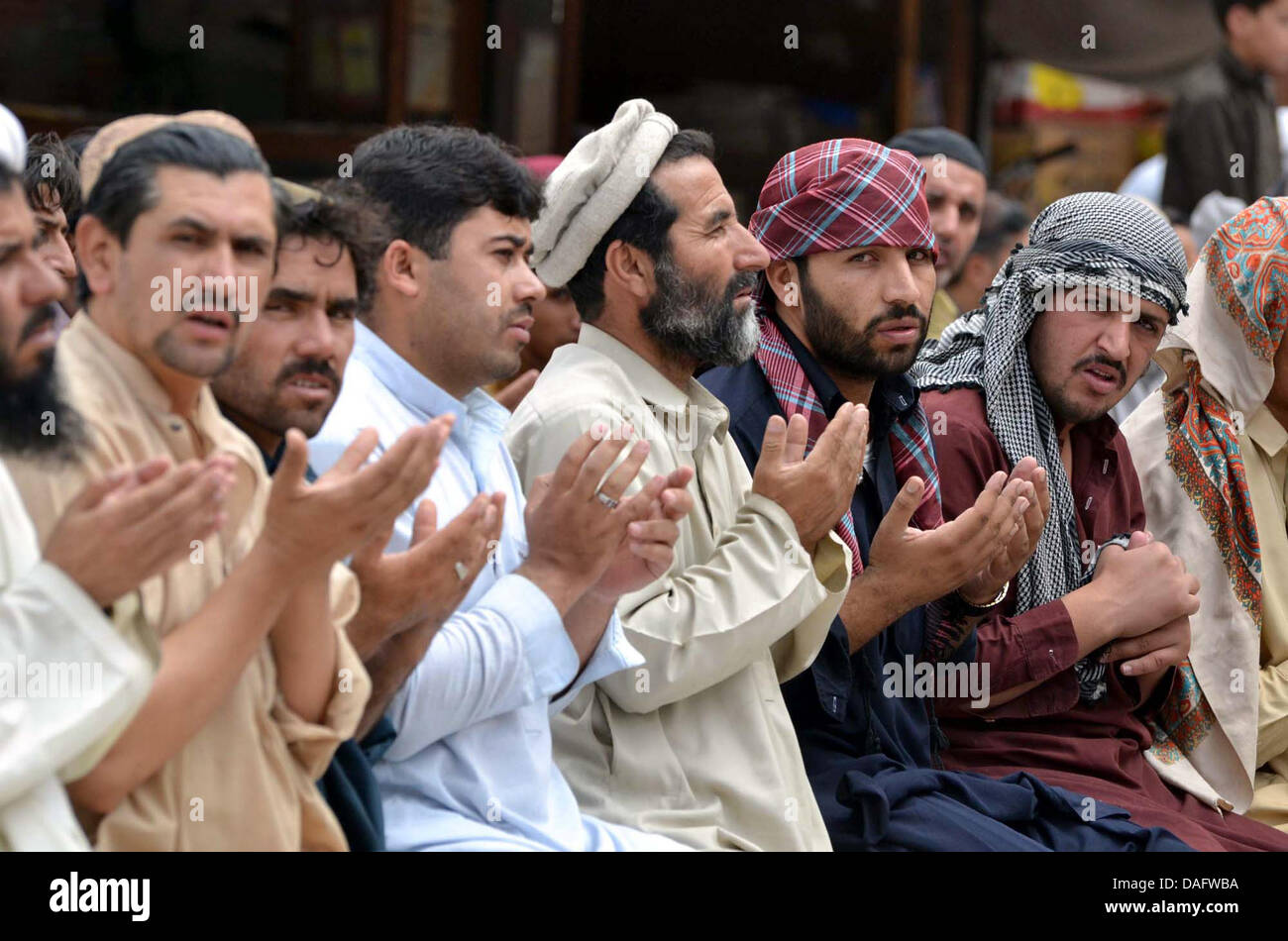 Muslims offering Dua after prayer on the first Friday of Ramzan-ul ...