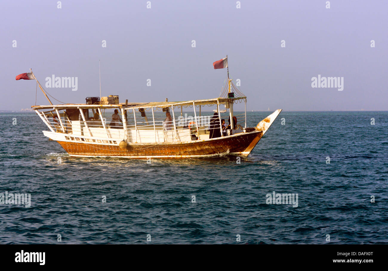 A Dhow operating as Passenger Ferry across the Bay of Doha, Qatar Stock ...