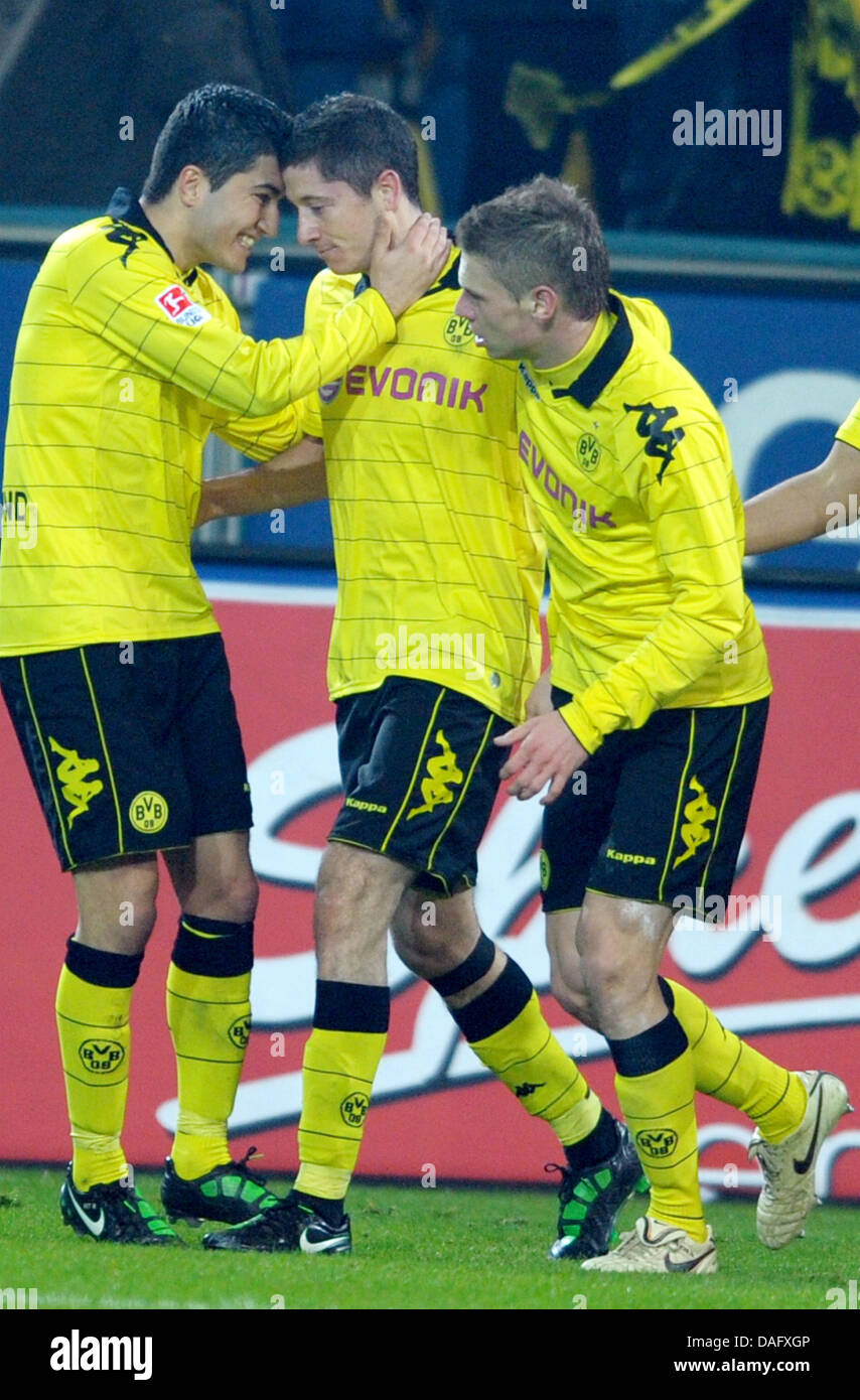 (R to L:) Dortmund's Nuri Sahin, Robert Lewandowski and Lukasz Piszczek ...