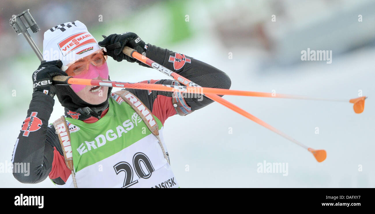 Andrea Henkel of Germany reacts after the 10km pursuit at the Biathlon ...