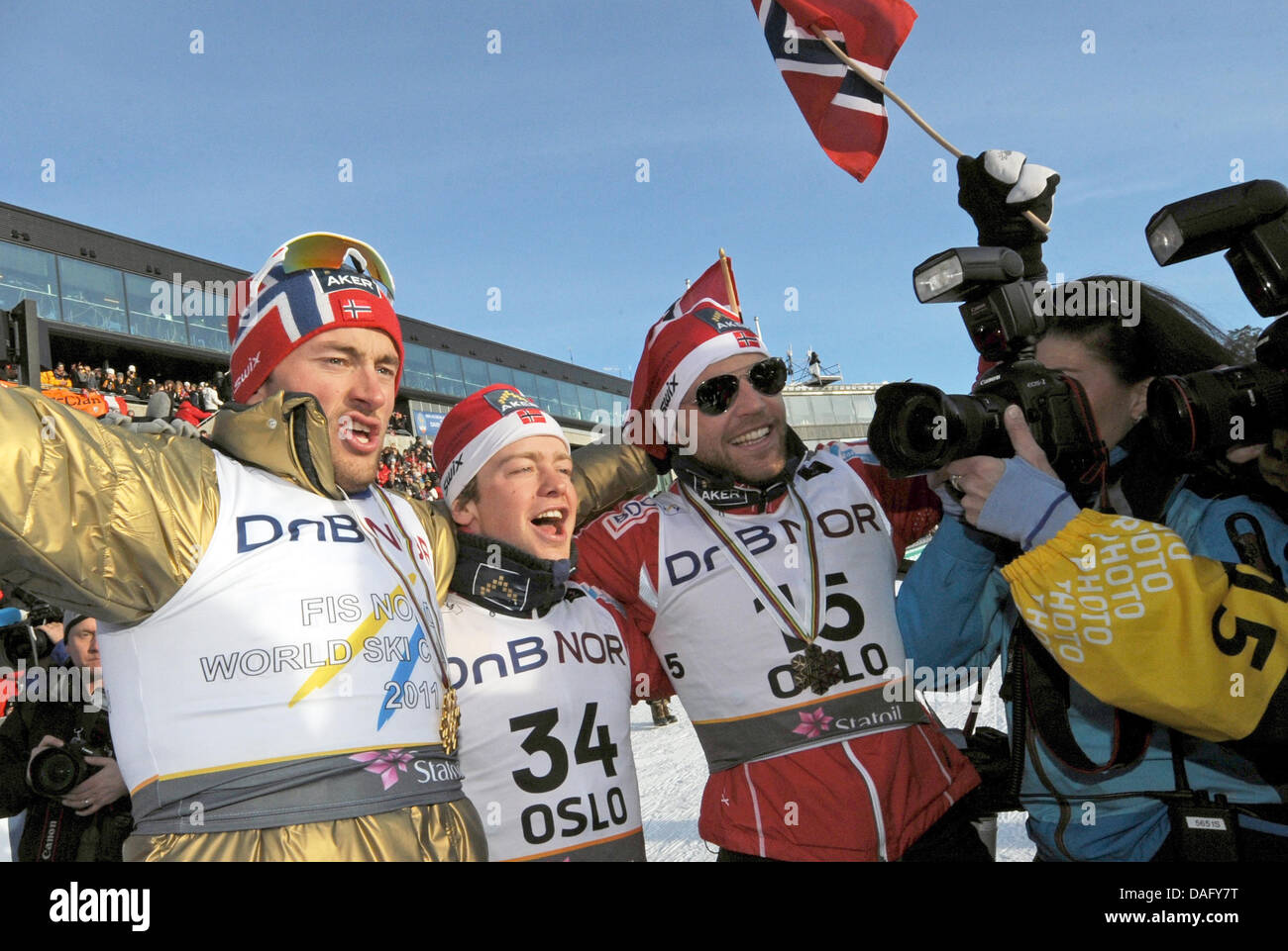 (L-R) Gold medalist Petter Northug with Sjur Roethe and Asle Tord ...