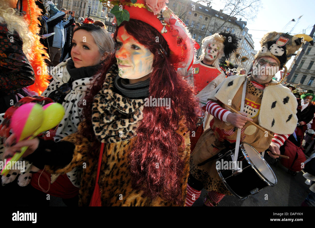 Dressed-up carnival revellers prepare for Shrove Monday parade in ...