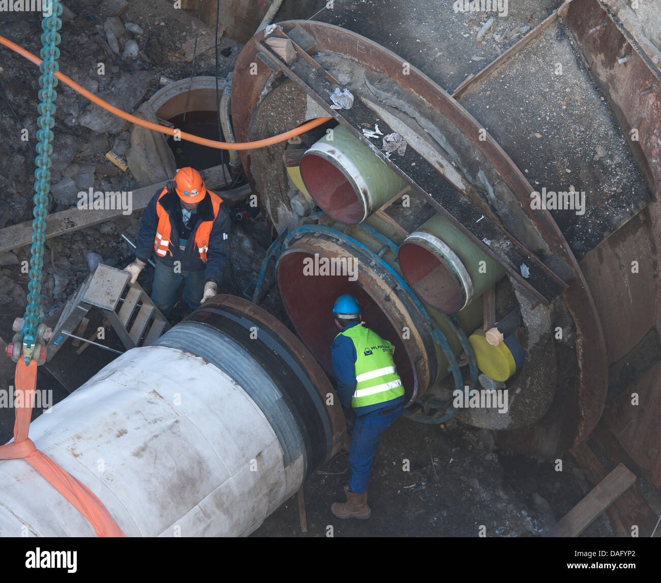 Staff of PPS Pipeline Systems install a standpipe under the harbour of ...