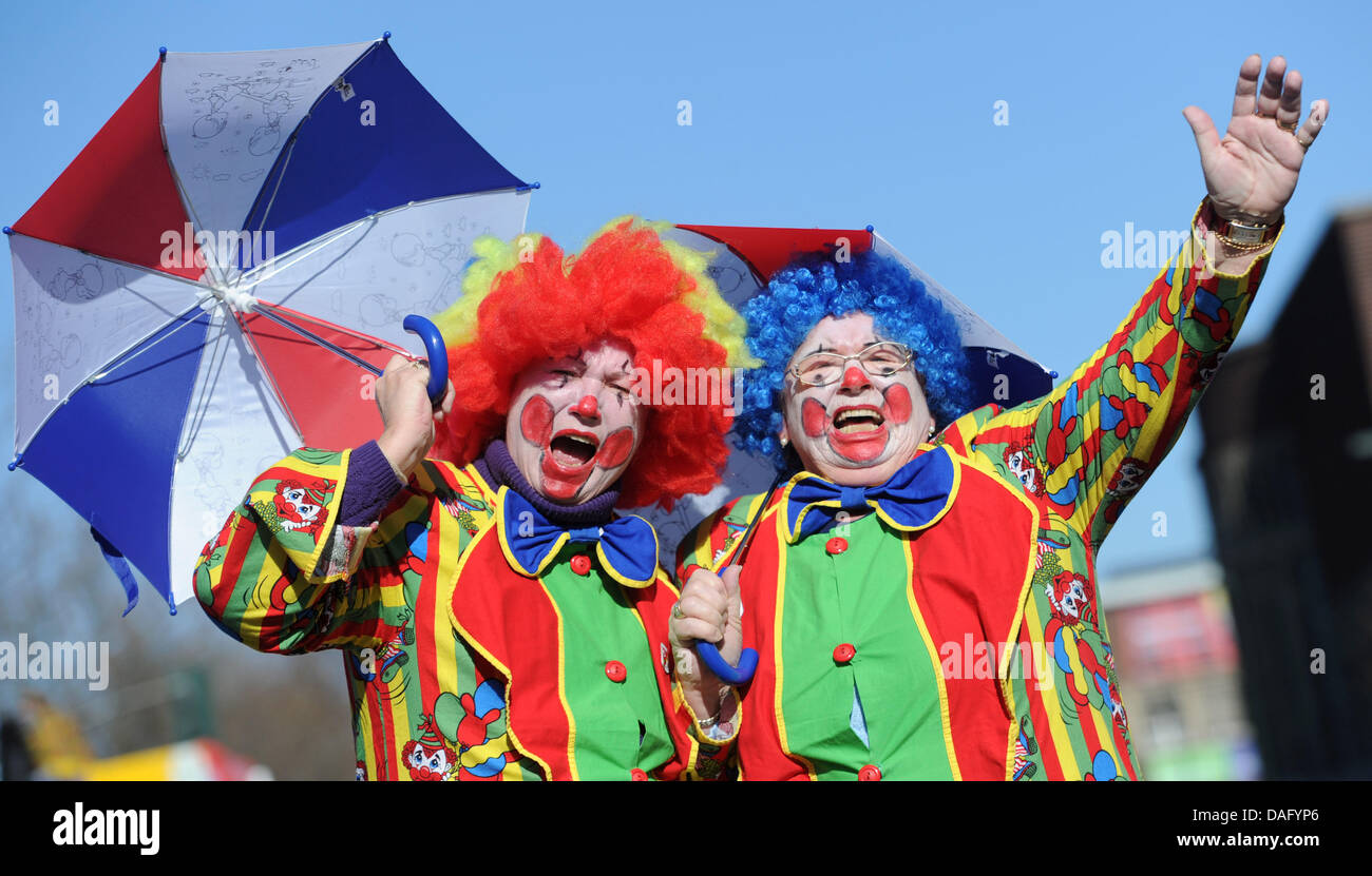 Dressed-up carnival revellers attend the Shrove Monday parade in ...