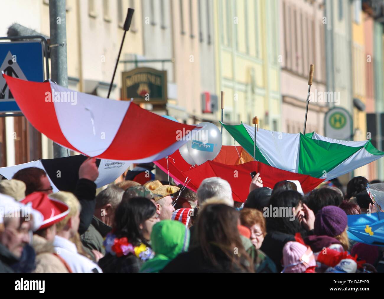 Dressed-up carnival revellers attend the Shrove Monday parade in ...