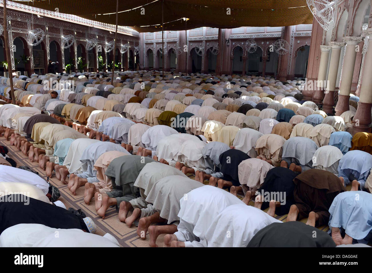 Muslims offering prayer on the first Friday of Ramzan-ul- Mubarak in ...