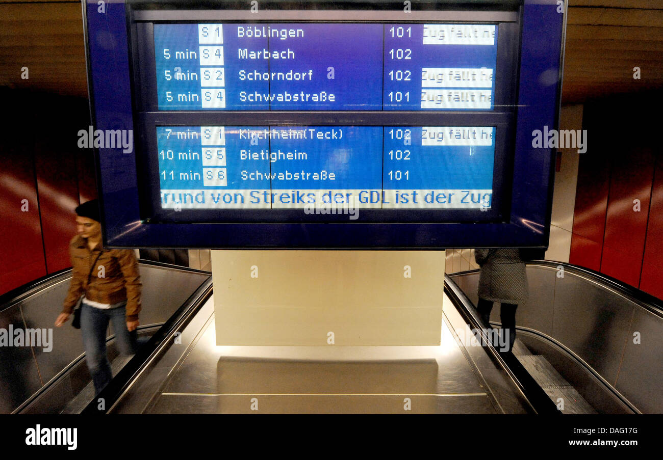 A destination board indicates cancelled trains at the main railway ...