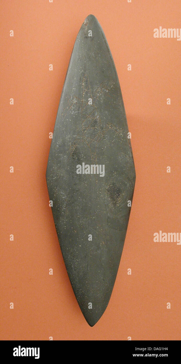 This ancient Egyptian palette, crafted from stone, was used for ...