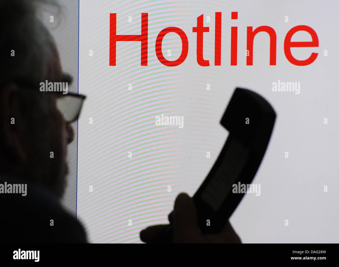 A file picture taken on 6 October 2010 shows a man with a telephone in ...