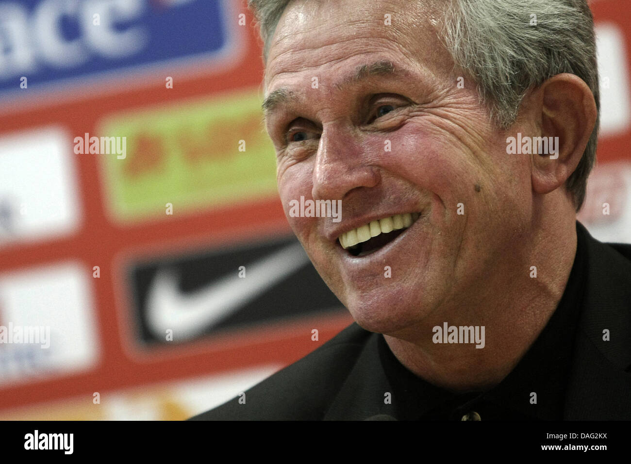 Leverkusen coach Jupp Heynckes laughs during a press conference ...
