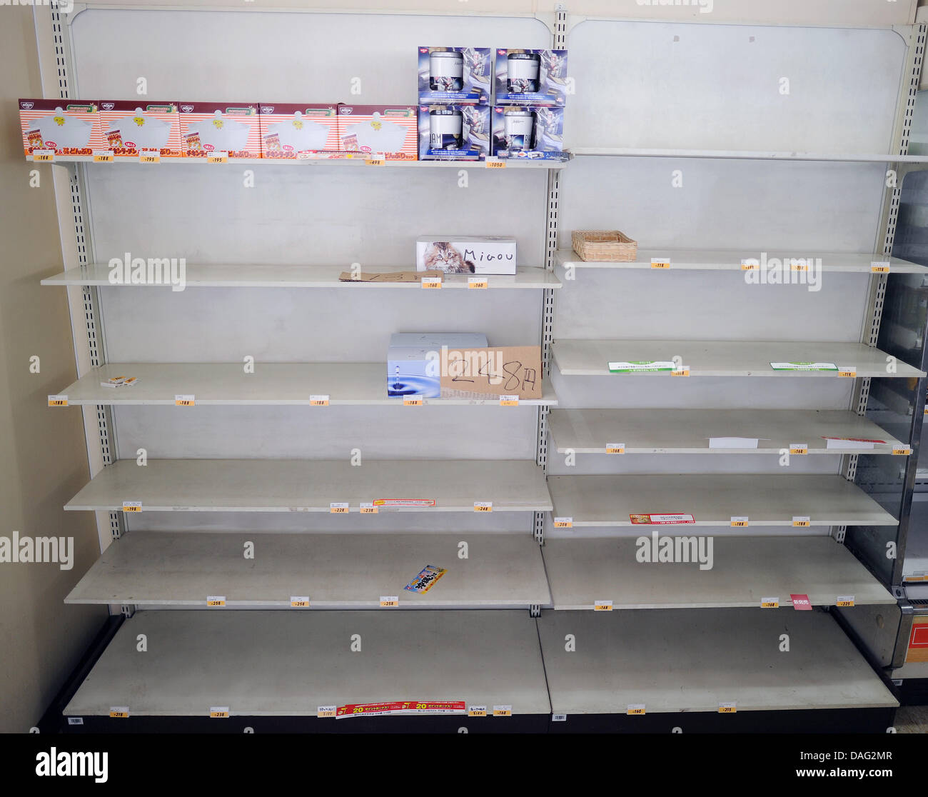 Monday (14/03/2011) a picture of the nearly empty shelves of a store ...