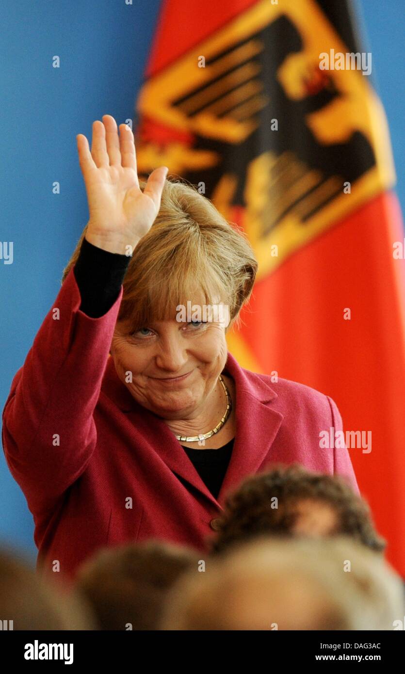 German Chancellor Angela Merkel delivers a speech at the celebrations ...