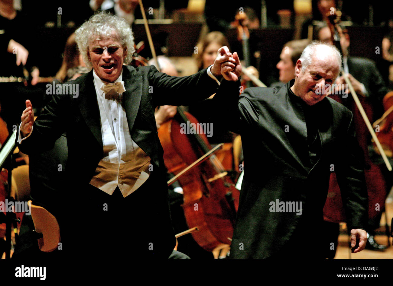 The principal conductor of the Berlin Philharmonic Orchestra, Sir Simon ...