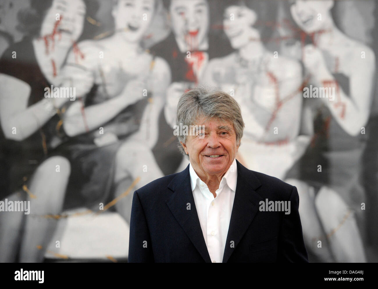 Frieder Burda stands in front of the work 'Party' (1963) of the artist ...