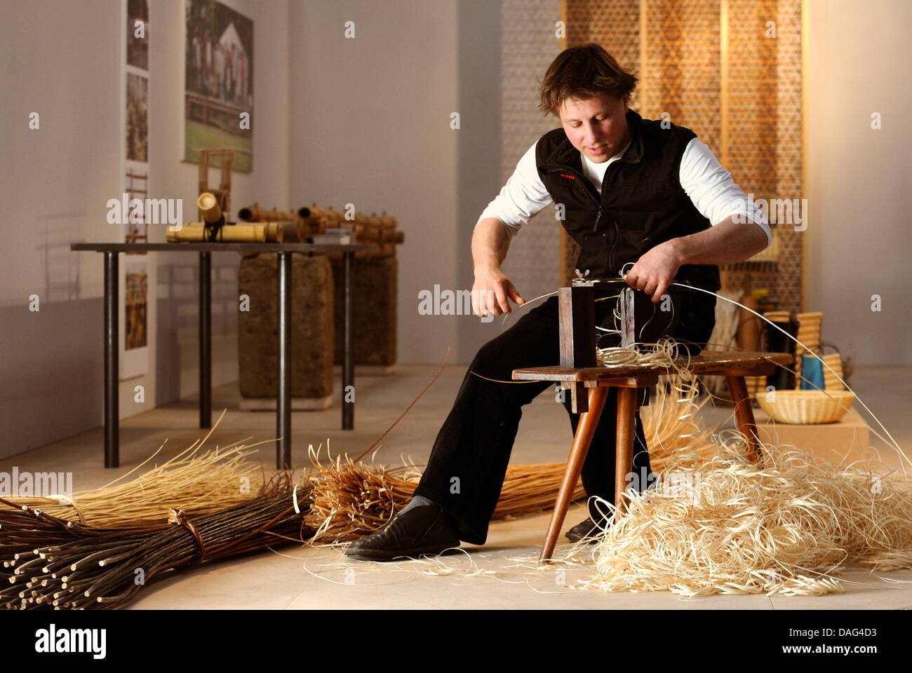 The picture shows the basket-maker Emmanuel Heringer working in his ...