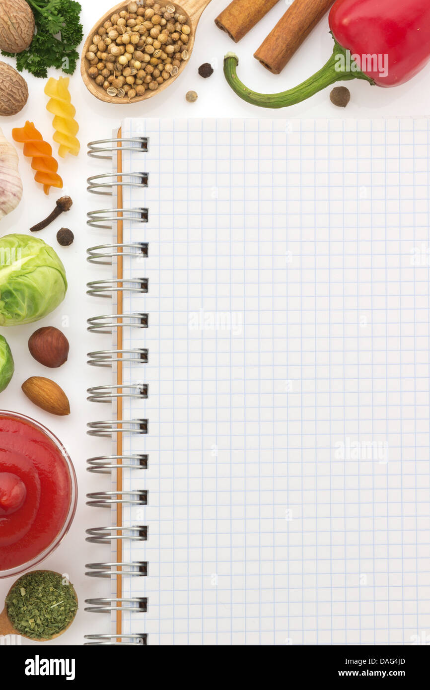 food ingredients and recipe book on white background Stock Photo - Alamy