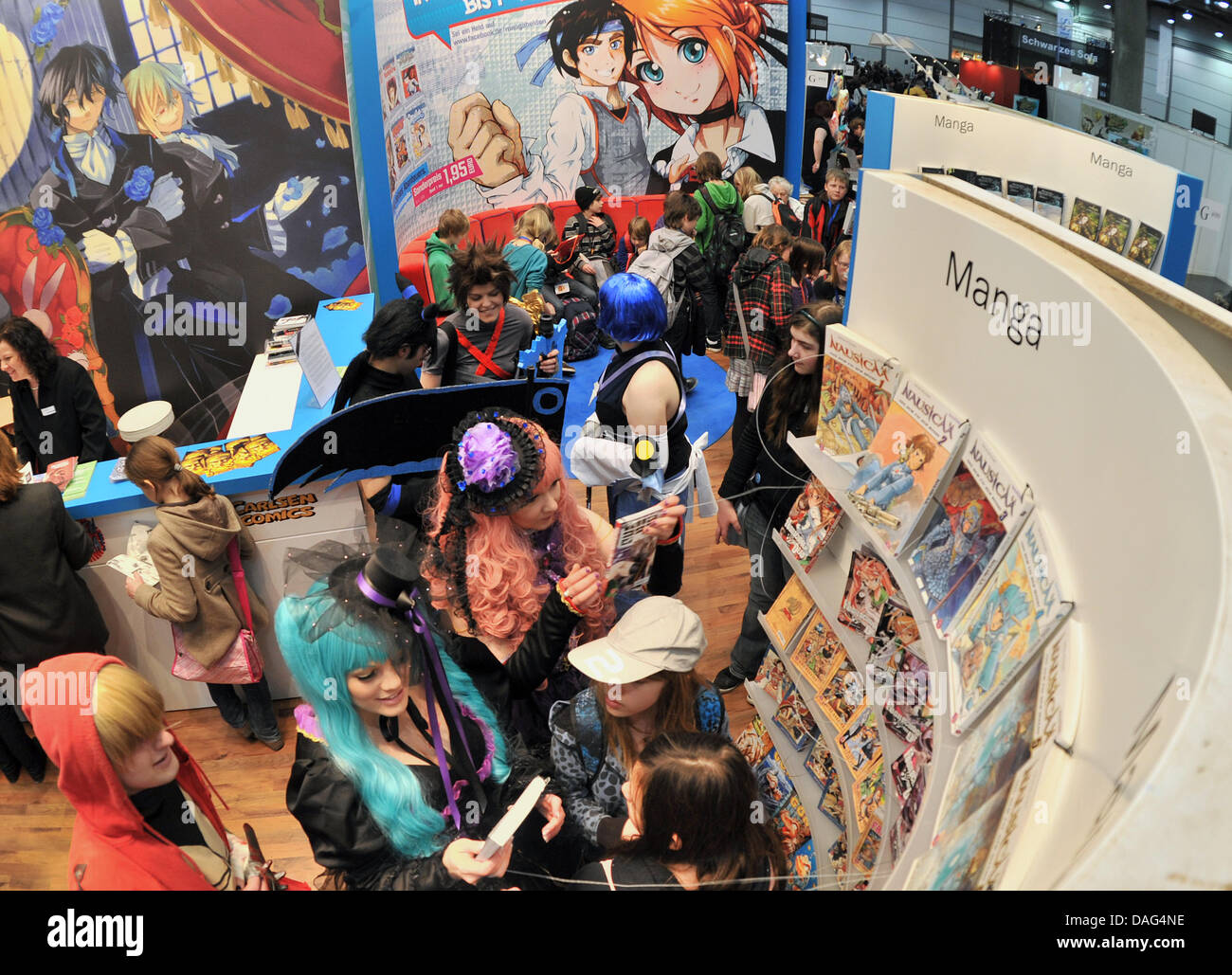 Manga afficionados eye a trade fair stand to the Leipzig Book Fair 2011 ...